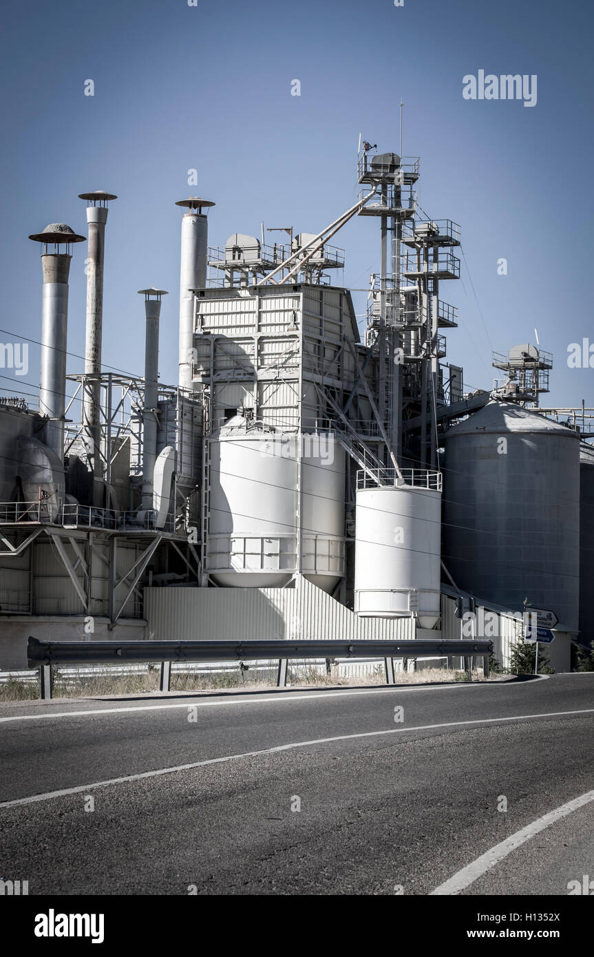 Industrial pipelines and towers, heavy industry overview Stock Photo ...