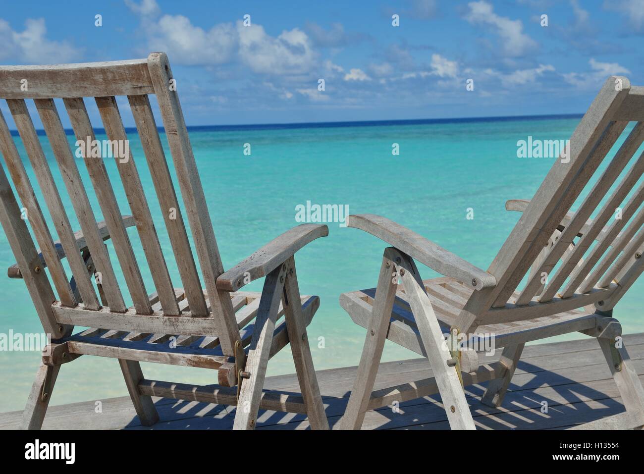 tropical beach chairs Stock Photo - Alamy