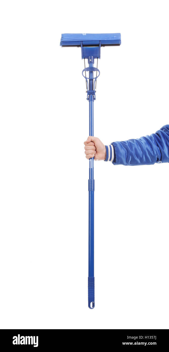 Hand holds blue mop with sponge Stock Photo - Alamy