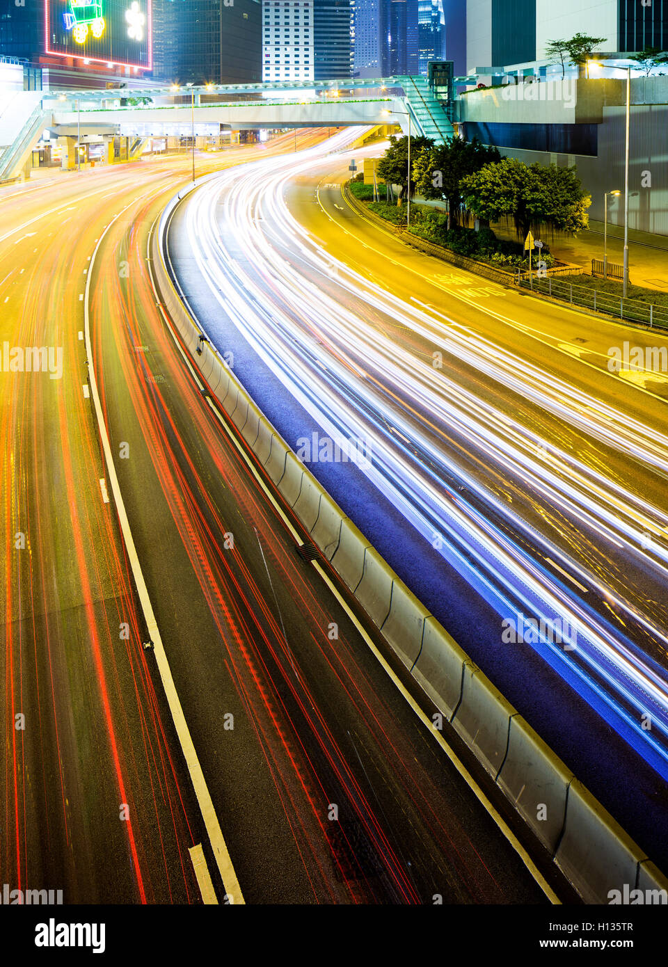 Hong Kong with traffic trail Stock Photo - Alamy