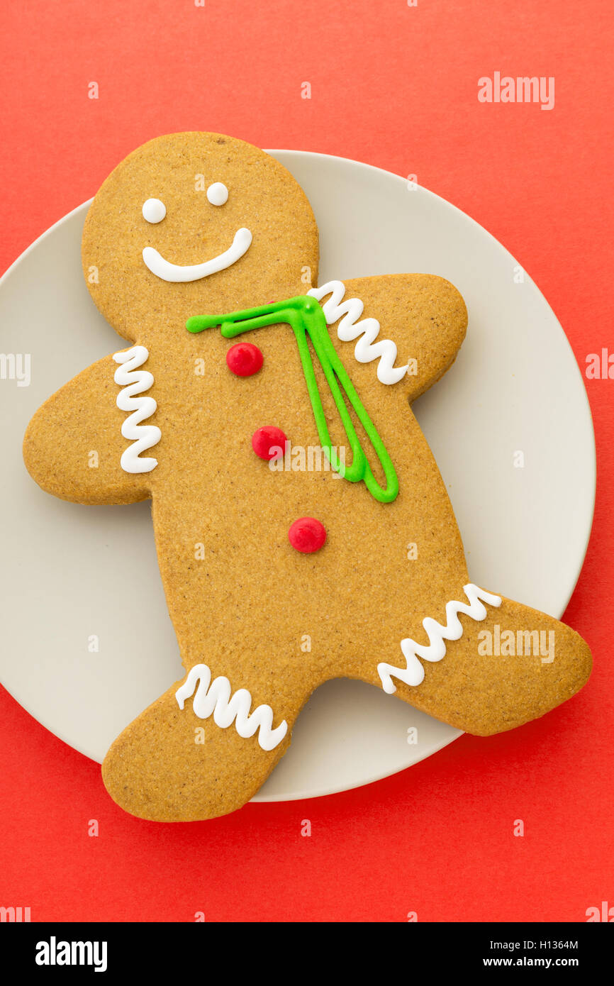 Gingerbread with red background Stock Photo - Alamy