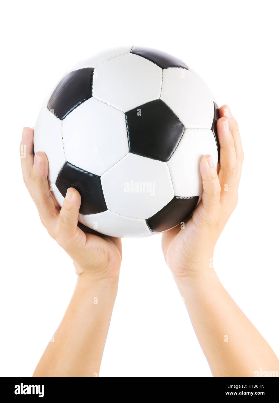 Hands holding soccer ball up isolated on white Stock Photo - Alamy