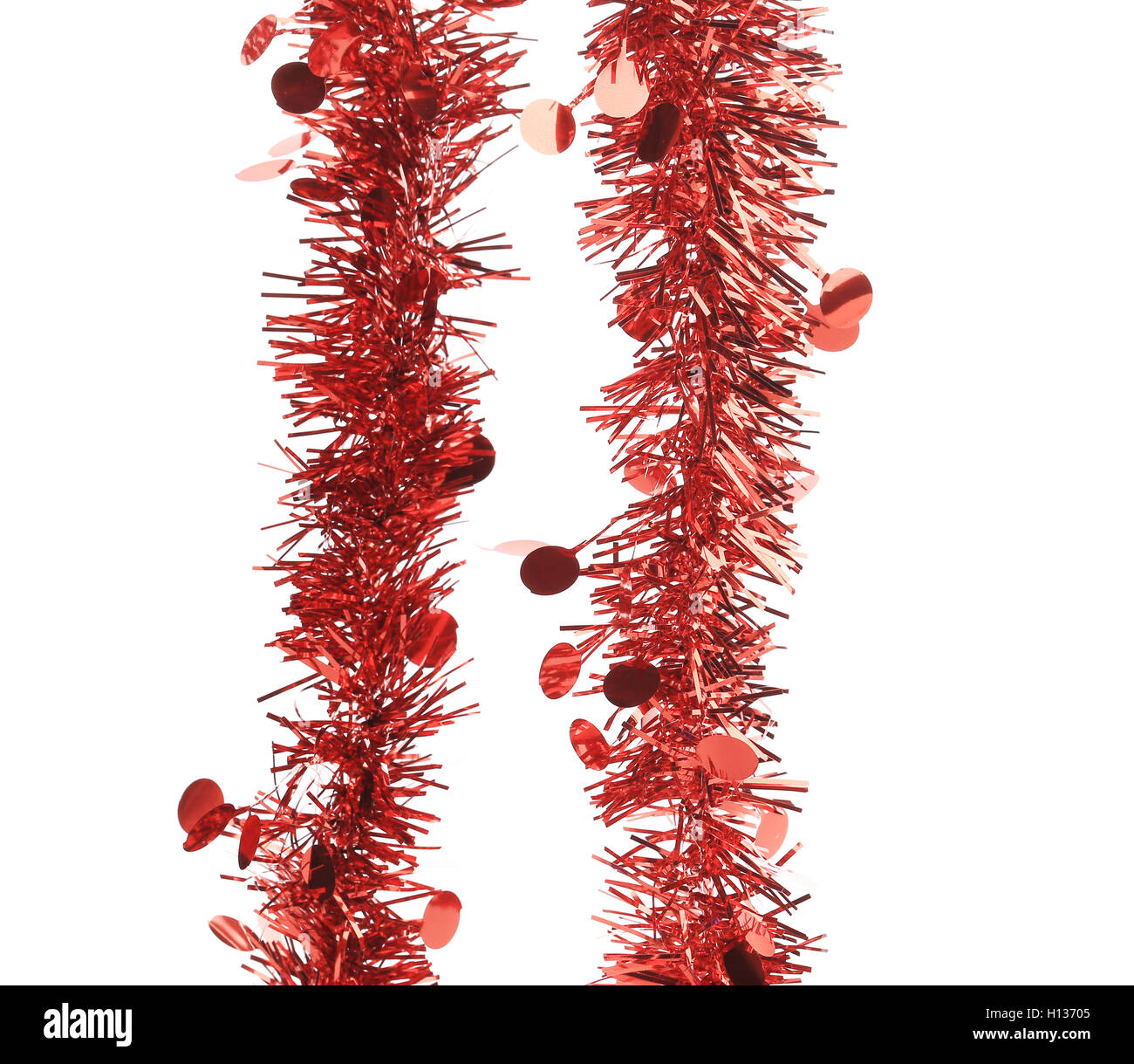 Christmas red tinsel with stars Stock Photo - Alamy