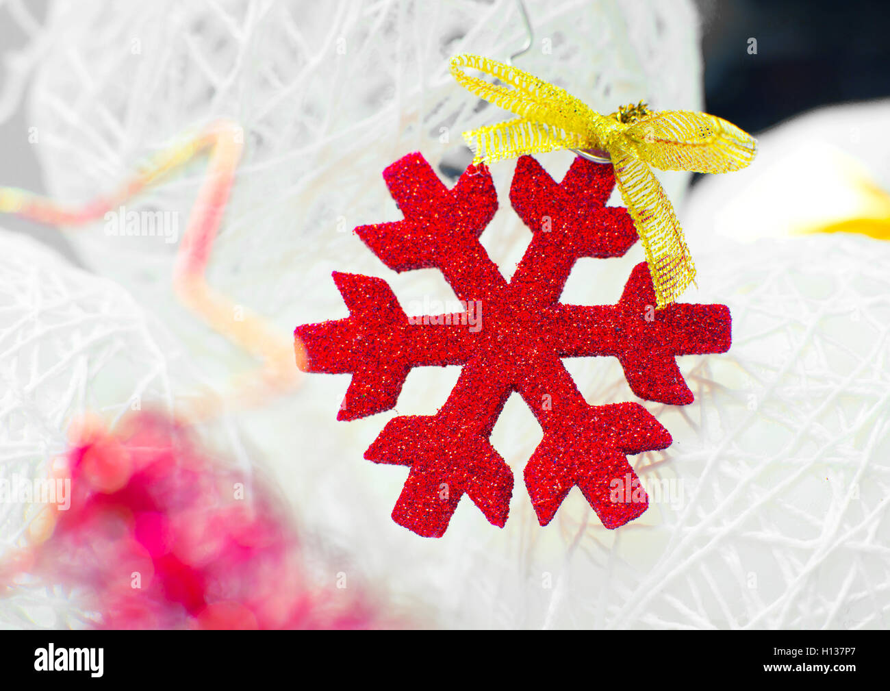 Red snowflake hi-res stock photography and images - Alamy