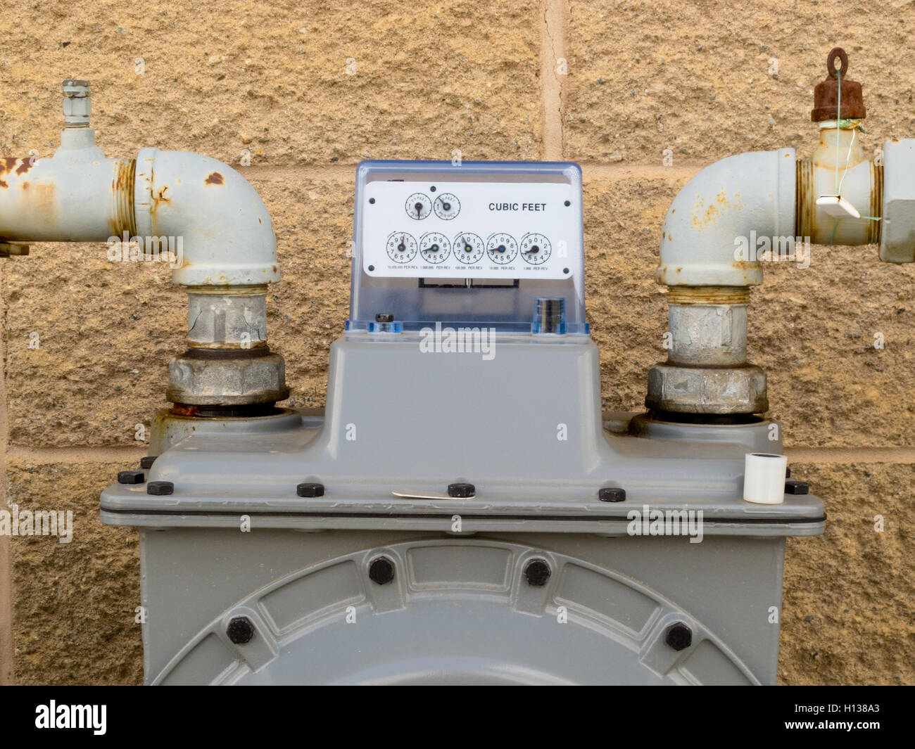 Outside wall natural gas meter dial display detail Stock Photo - Alamy