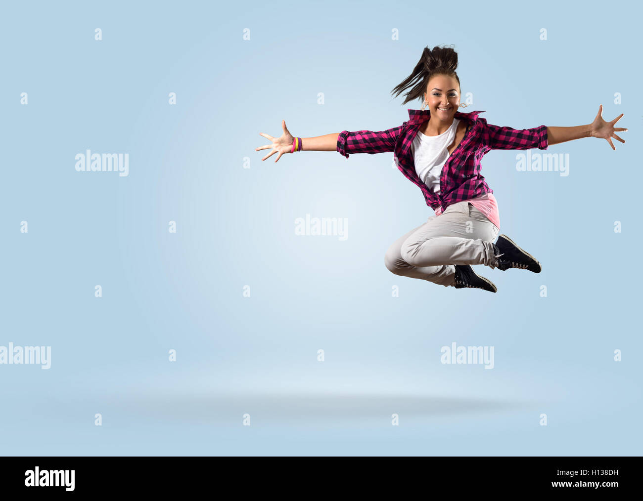 young female dancer jumping Stock Photo - Alamy