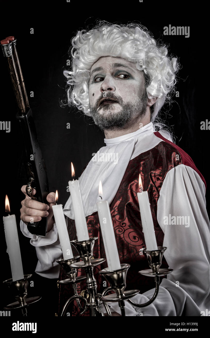 Musket and candle, gentleman rococo era wig Stock Photo - Alamy
