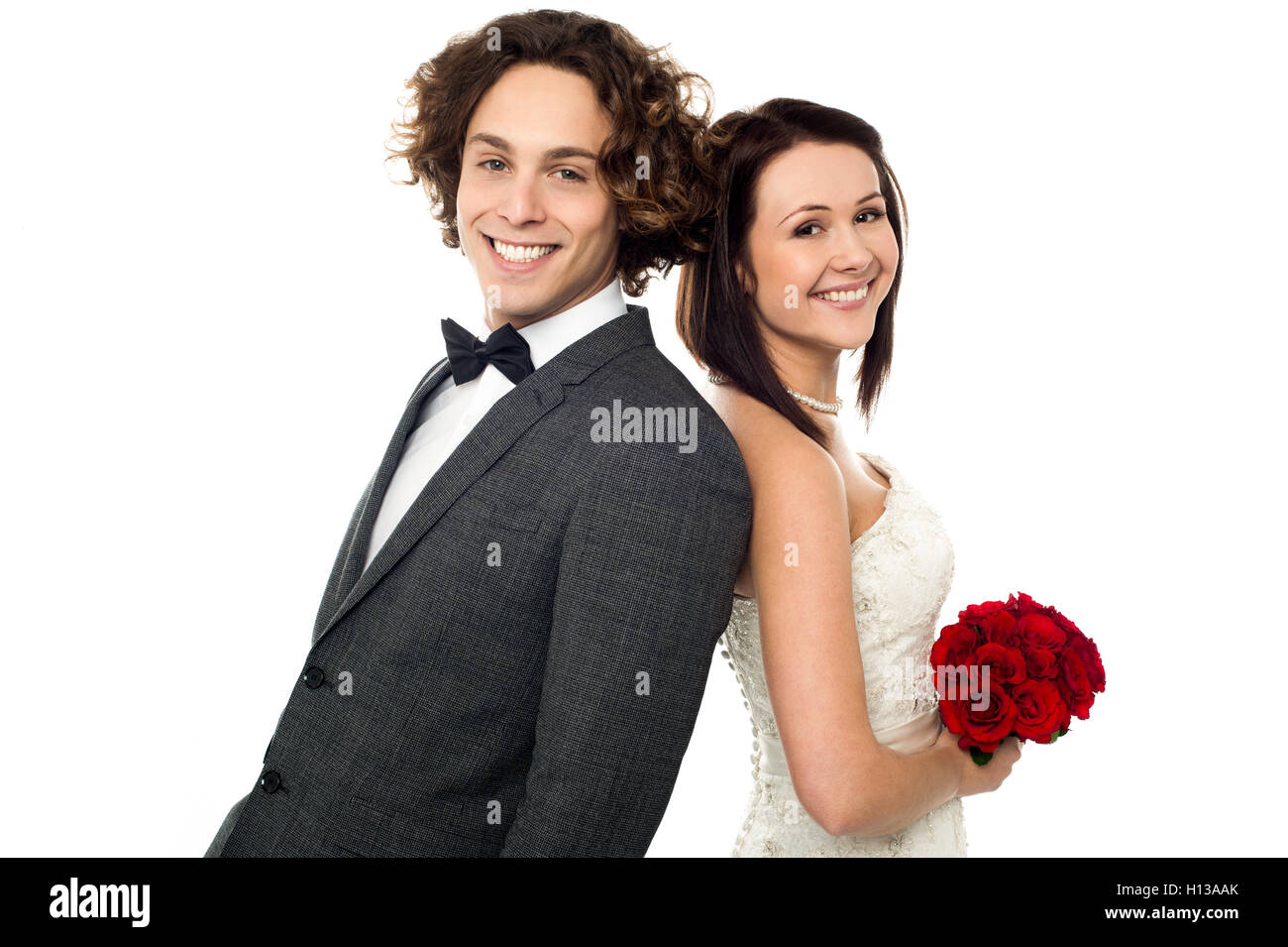 Love couple, back to back. Studio shot Stock Photo - Alamy