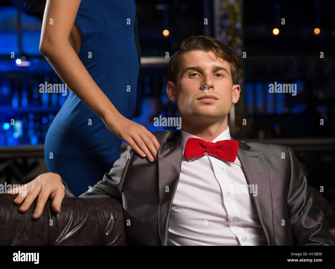 Portrait of a successful man in a nightclub Stock Photo - Alamy
