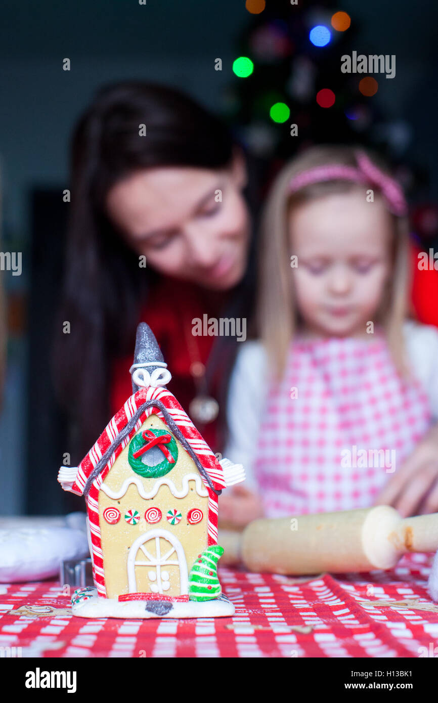 Gingerbread fairy house decorated by colorful candies on a background ...