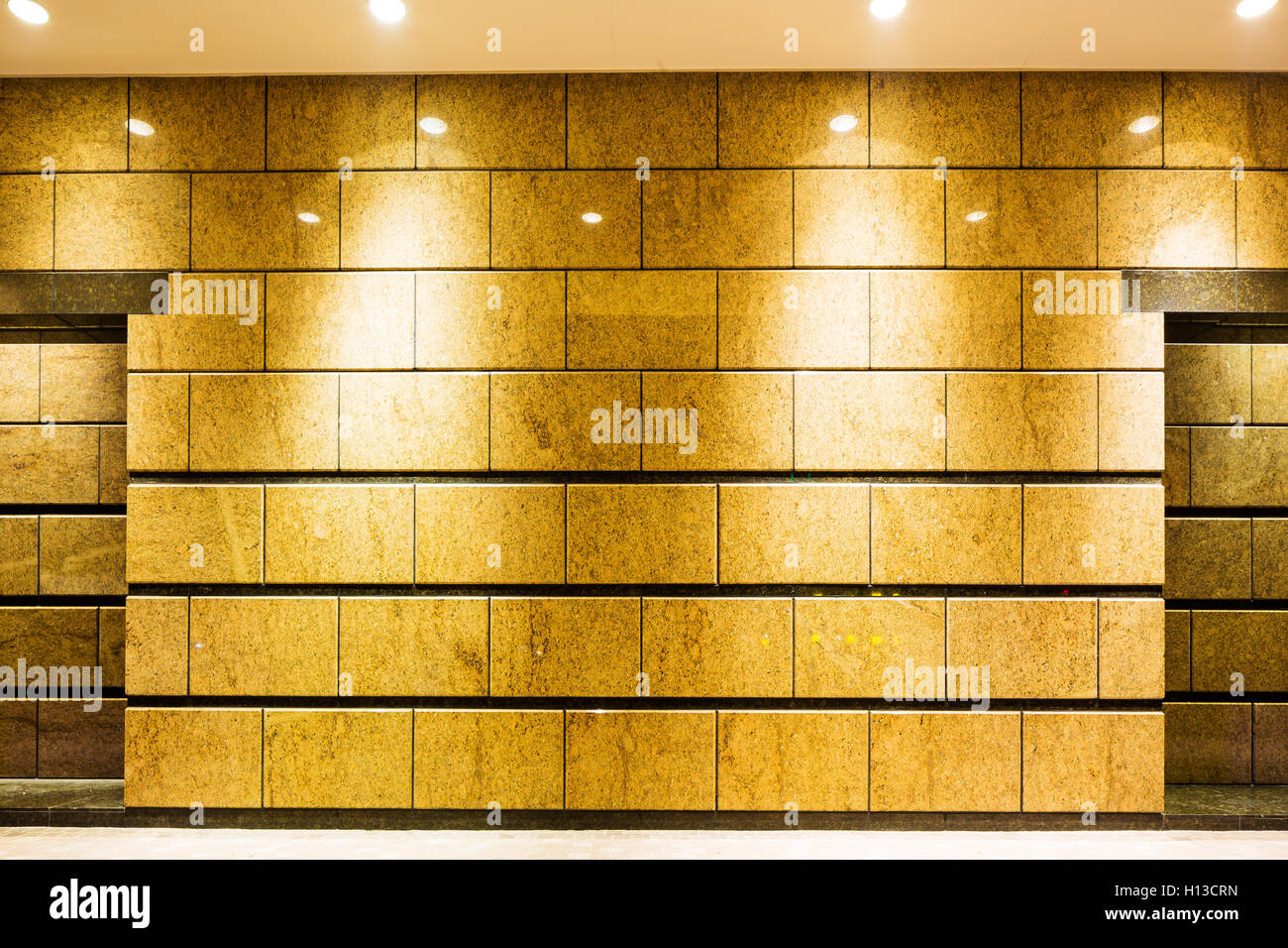 Marble brick wall inside building Stock Photo - Alamy