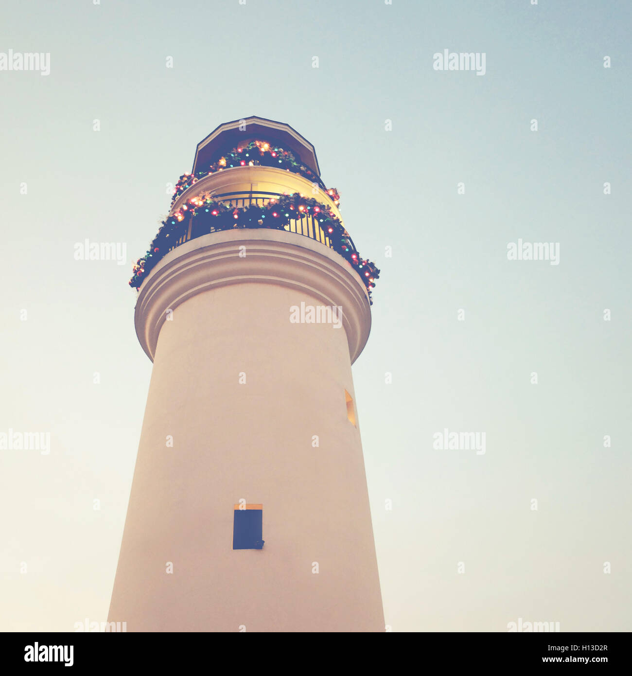 Lighthouse with christmas ornaments, retro filter effect Stock Photo ...