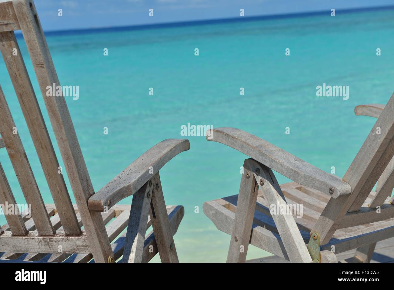tropical beach chairs Stock Photo - Alamy