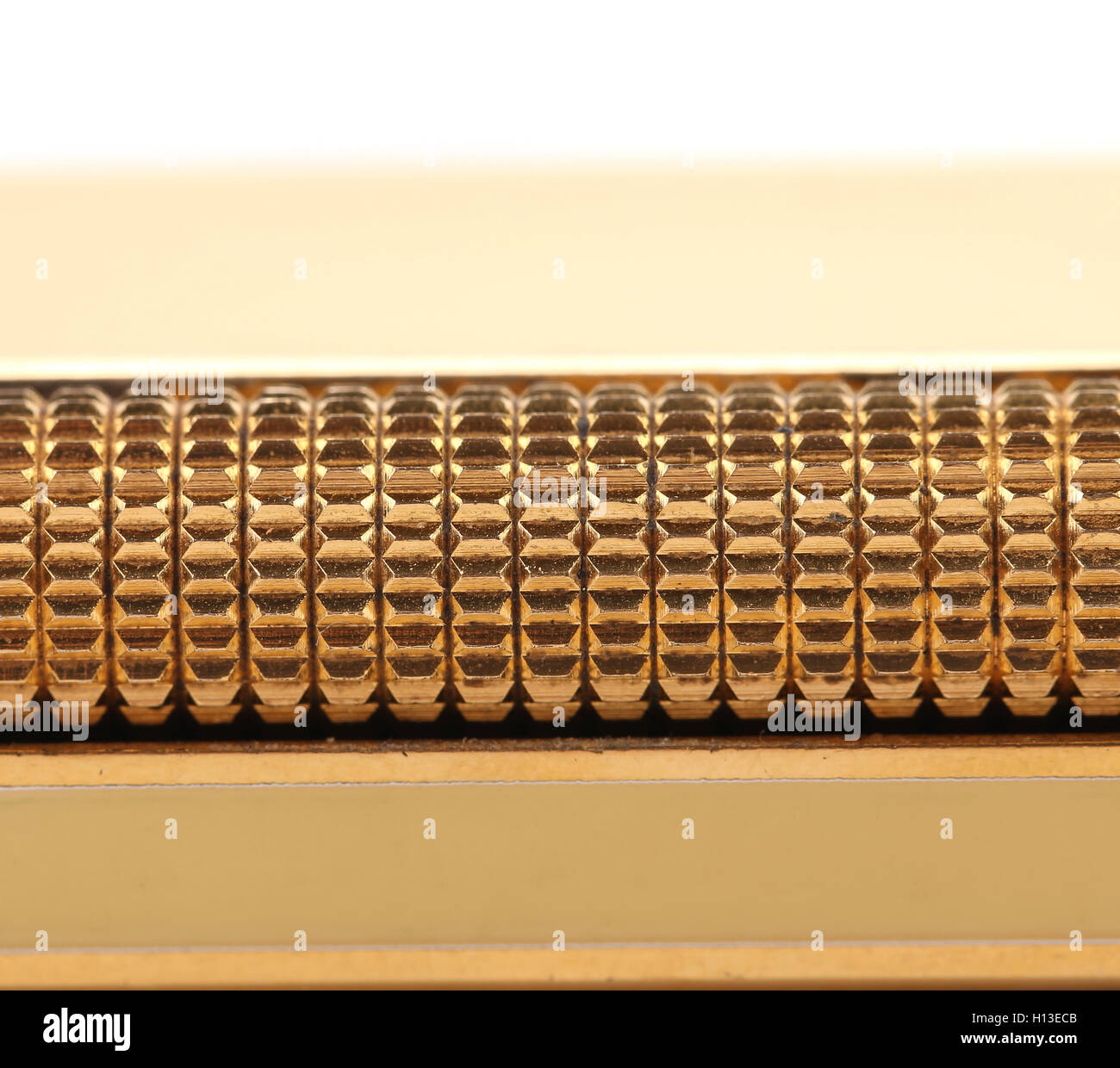 Metal flint golden on gas lighter Stock Photo - Alamy