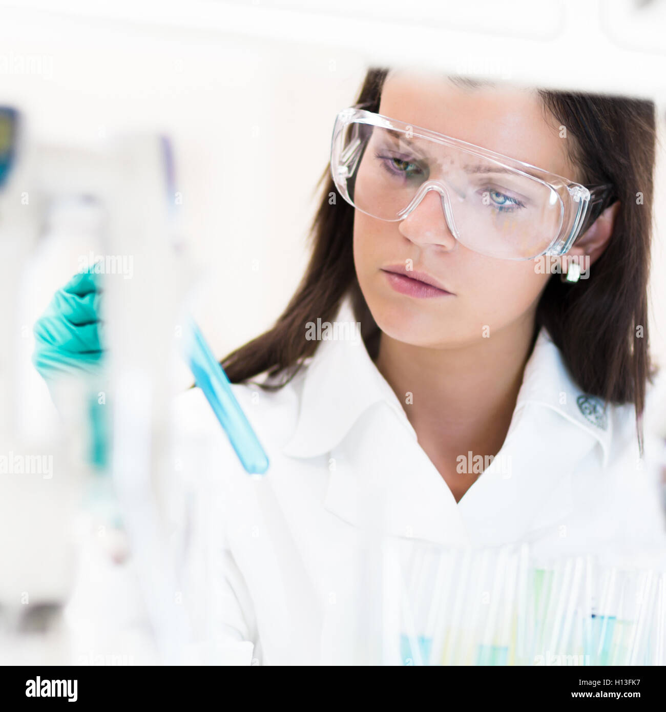 Female chemist microscope flask hi-res stock photography and images - Alamy