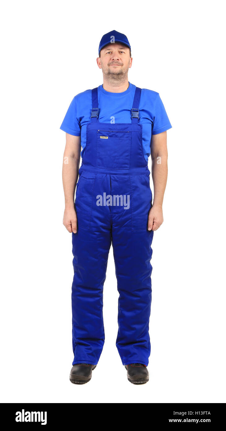 Worker in blue overalls Stock Photo - Alamy