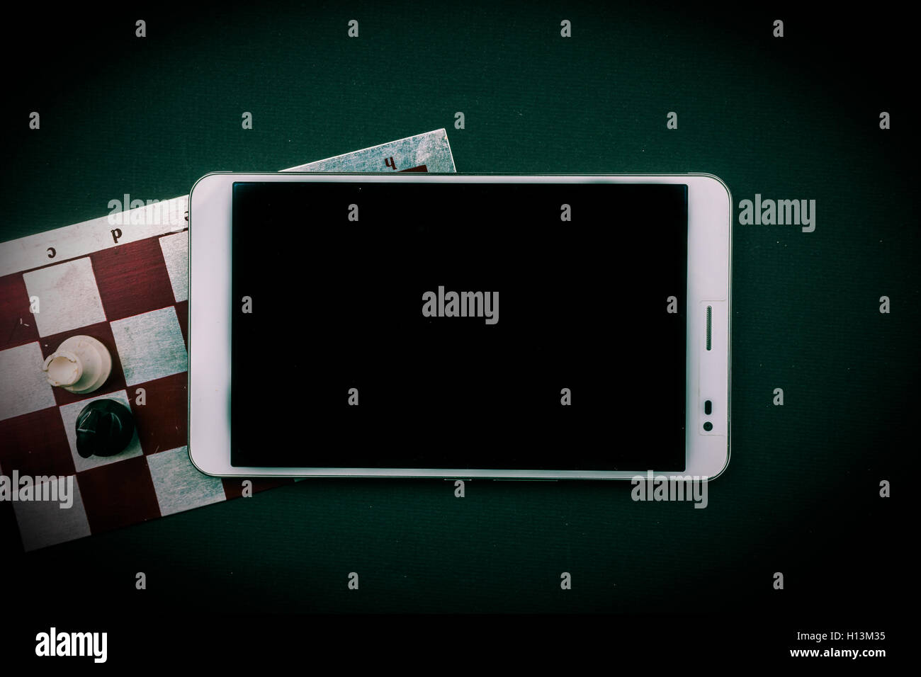 Various board games with tablet pc Stock Photo - Alamy
