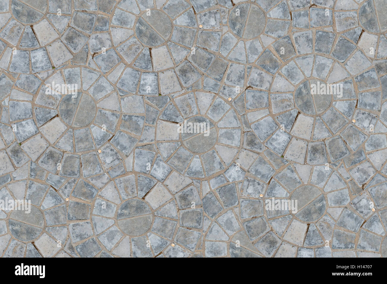 Cobble circular pattern block pavement texture background. Top view ...