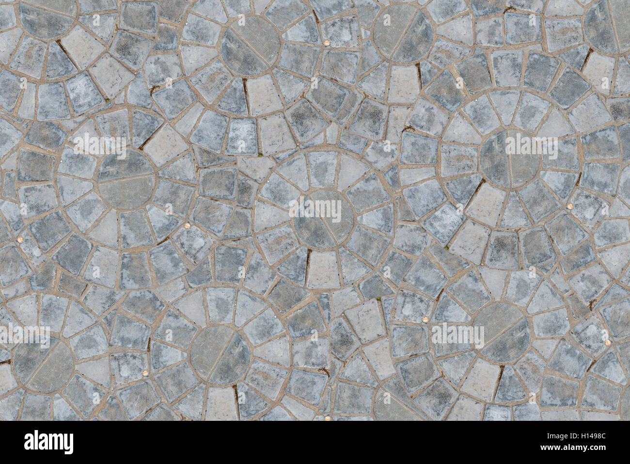 Cobble circular pattern block pavement texture background. Top view ...