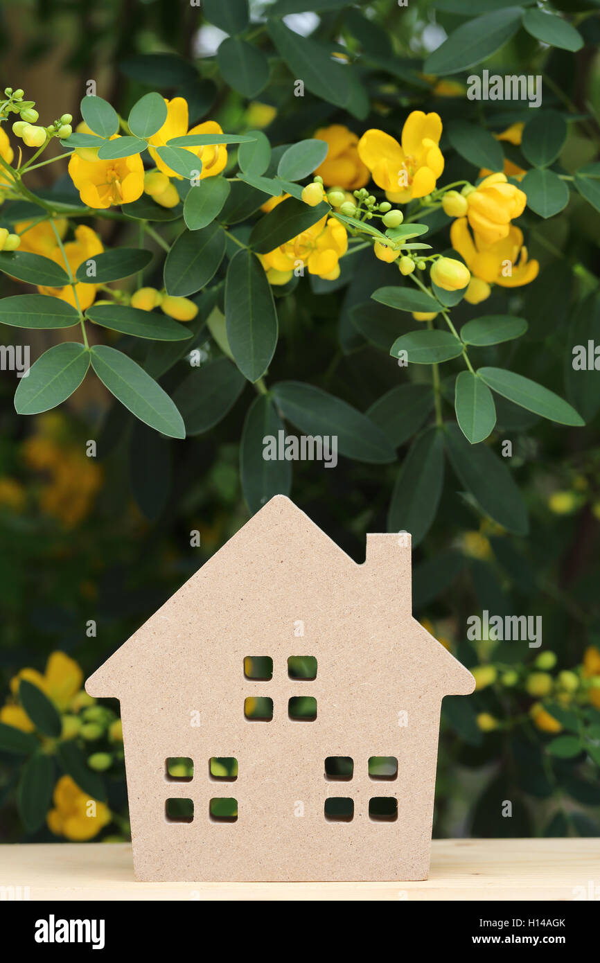 wooden toy house with beautiful blossom tree Stock Photo - Alamy