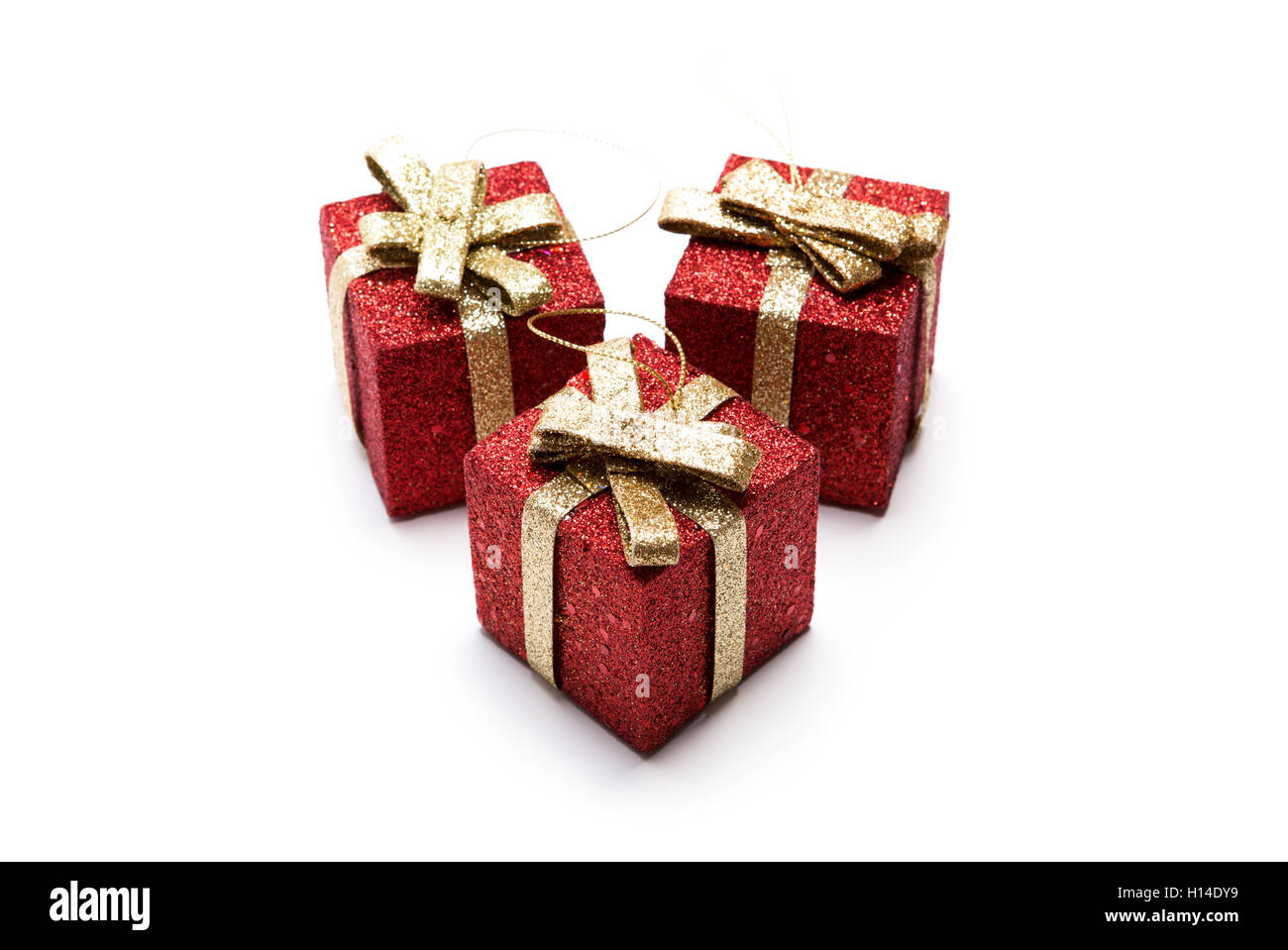 Artificial red gift boxes Stock Photo - Alamy
