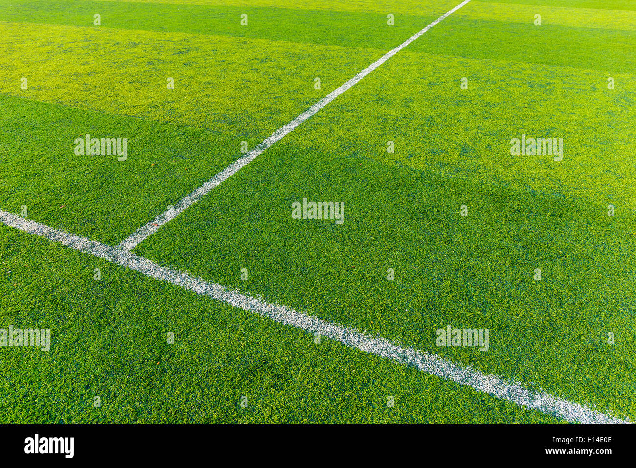 Synthetic football field Stock Photo - Alamy