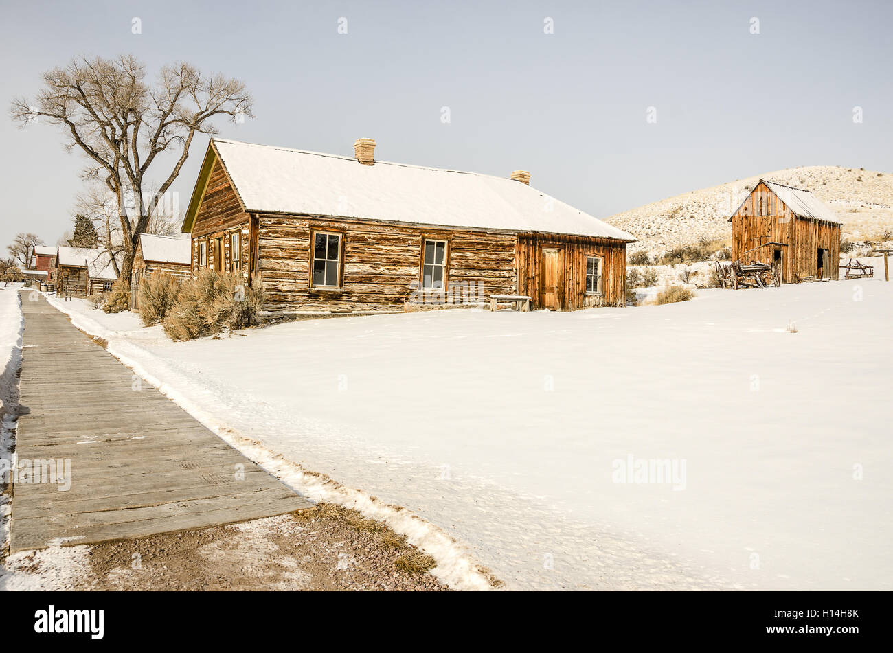 Houses in a ghost town with a nice boardwalk Stock Photo - Alamy
