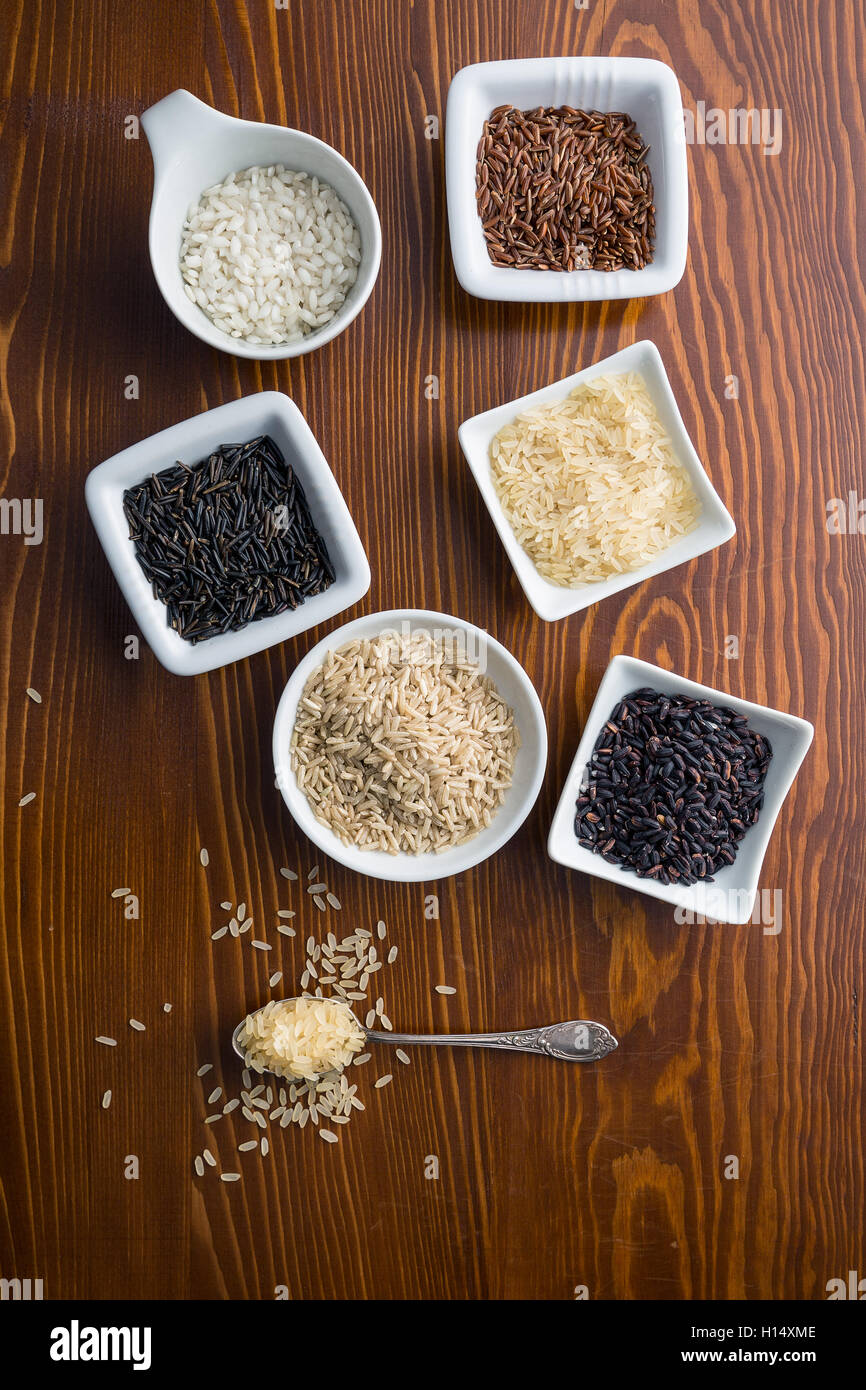 Different rice varieties in bowl. Top view Stock Photo - Alamy