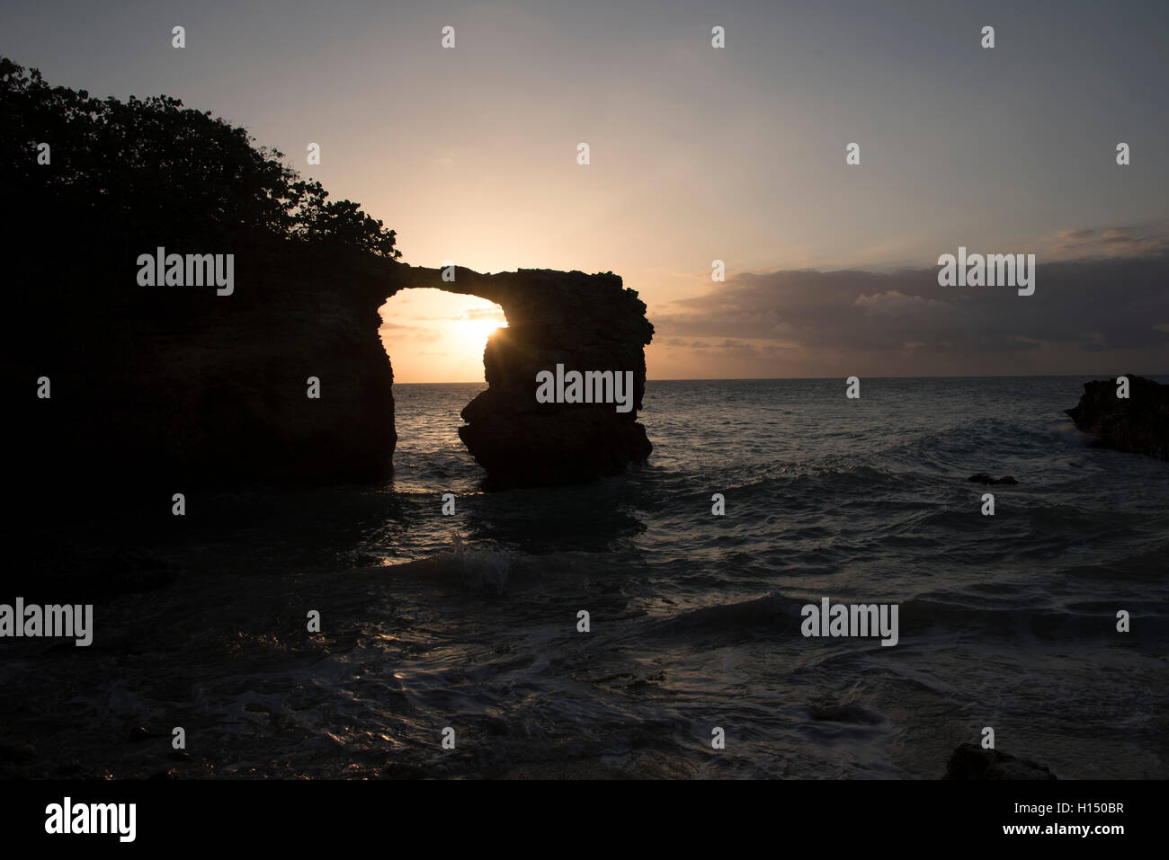 Sunset natural bridge by cabo rojo hi-res stock photography and images ...