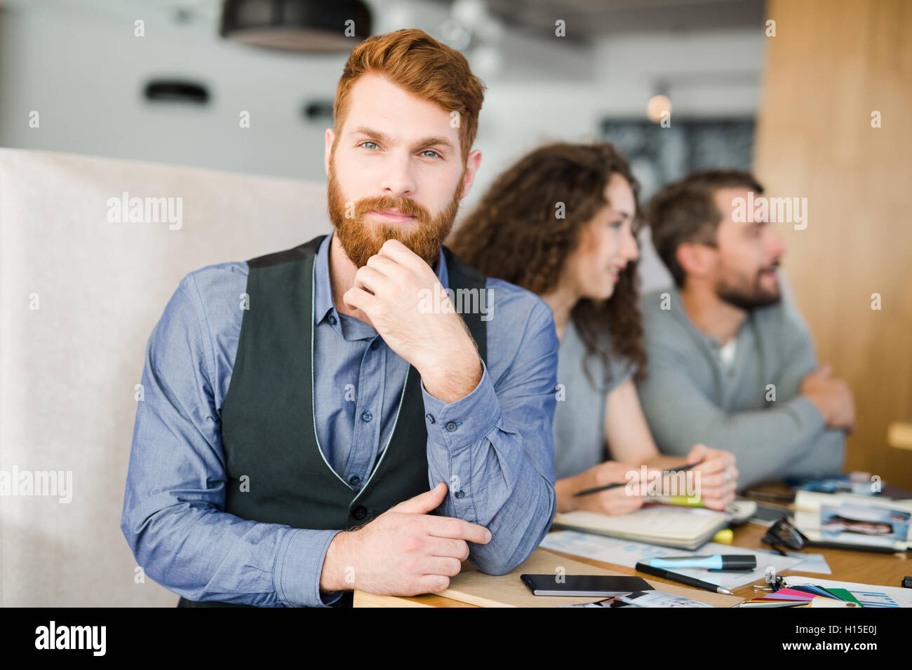Leader of design team Stock Photo - Alamy