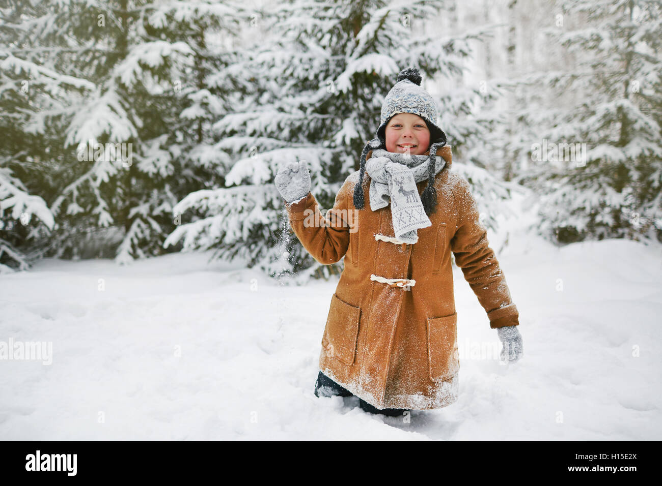 Boy with snowball Stock Photo - Alamy