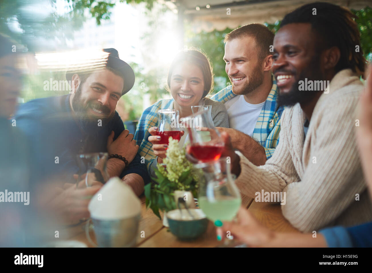 Happy time young friends cheering hi-res stock photography and images ...