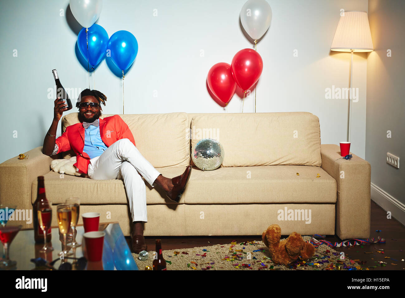 Guy at party Stock Photo - Alamy