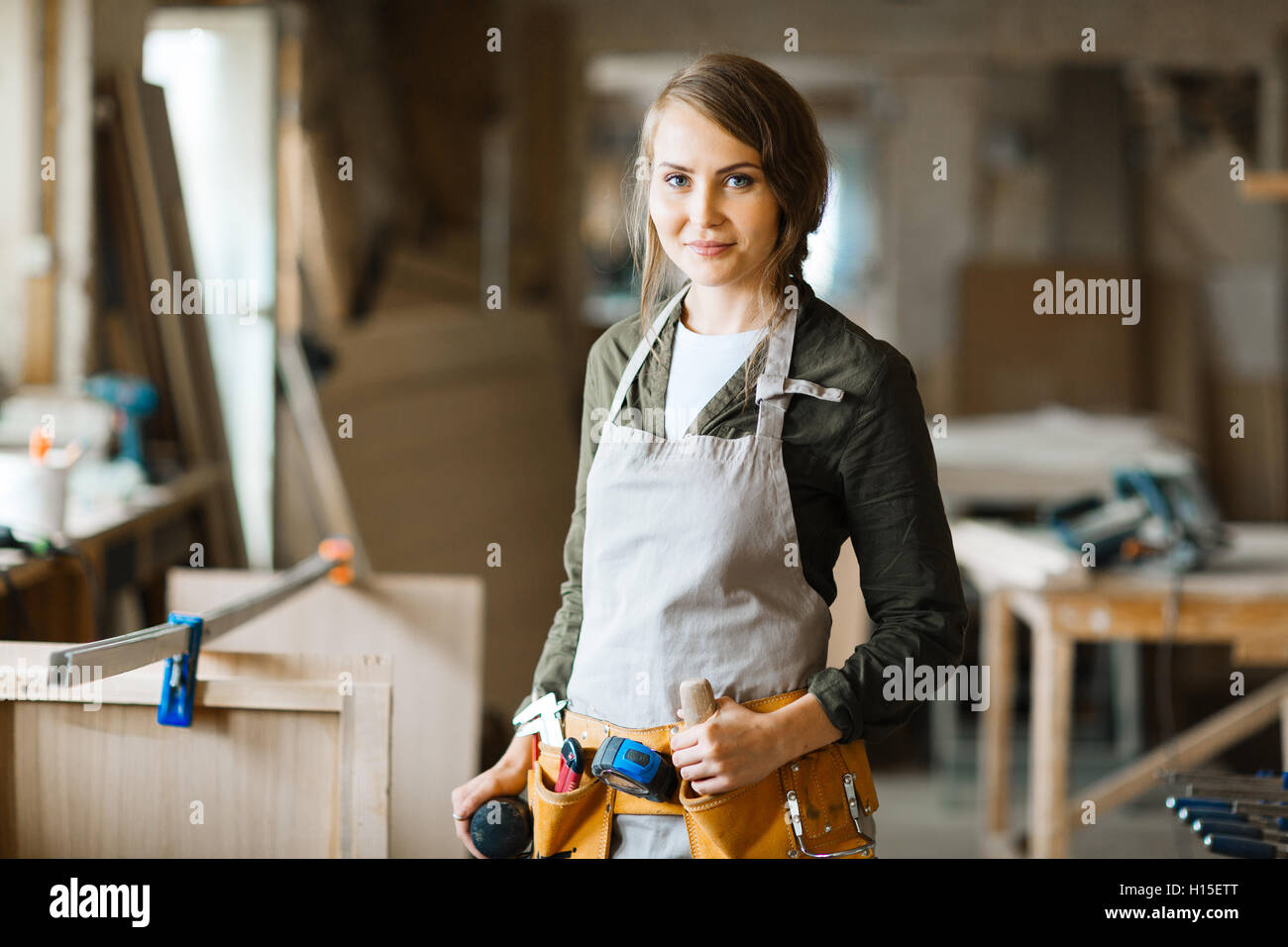 Woman tool belt hi-res stock photography and images - Alamy