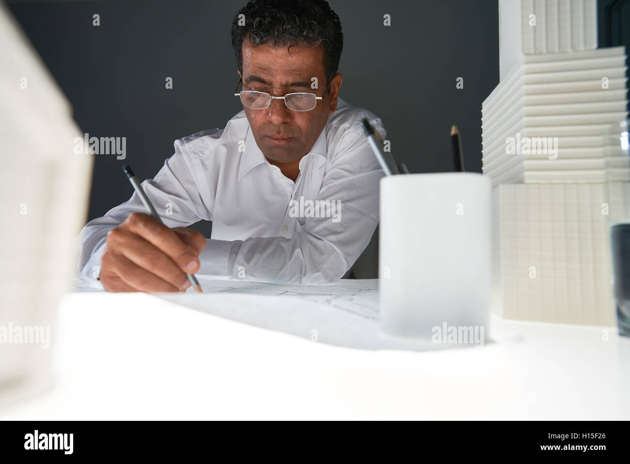 Engineer drawing sketch Stock Photo - Alamy