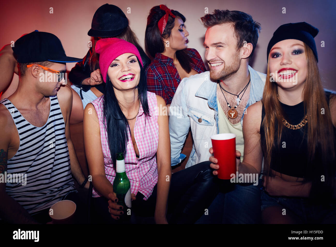 Excited Friends Clubbing at Swag Party Stock Photo - Alamy