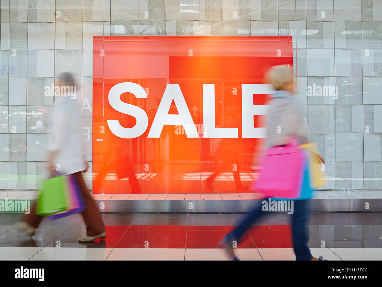 Sale in shopping center Stock Photo - Alamy