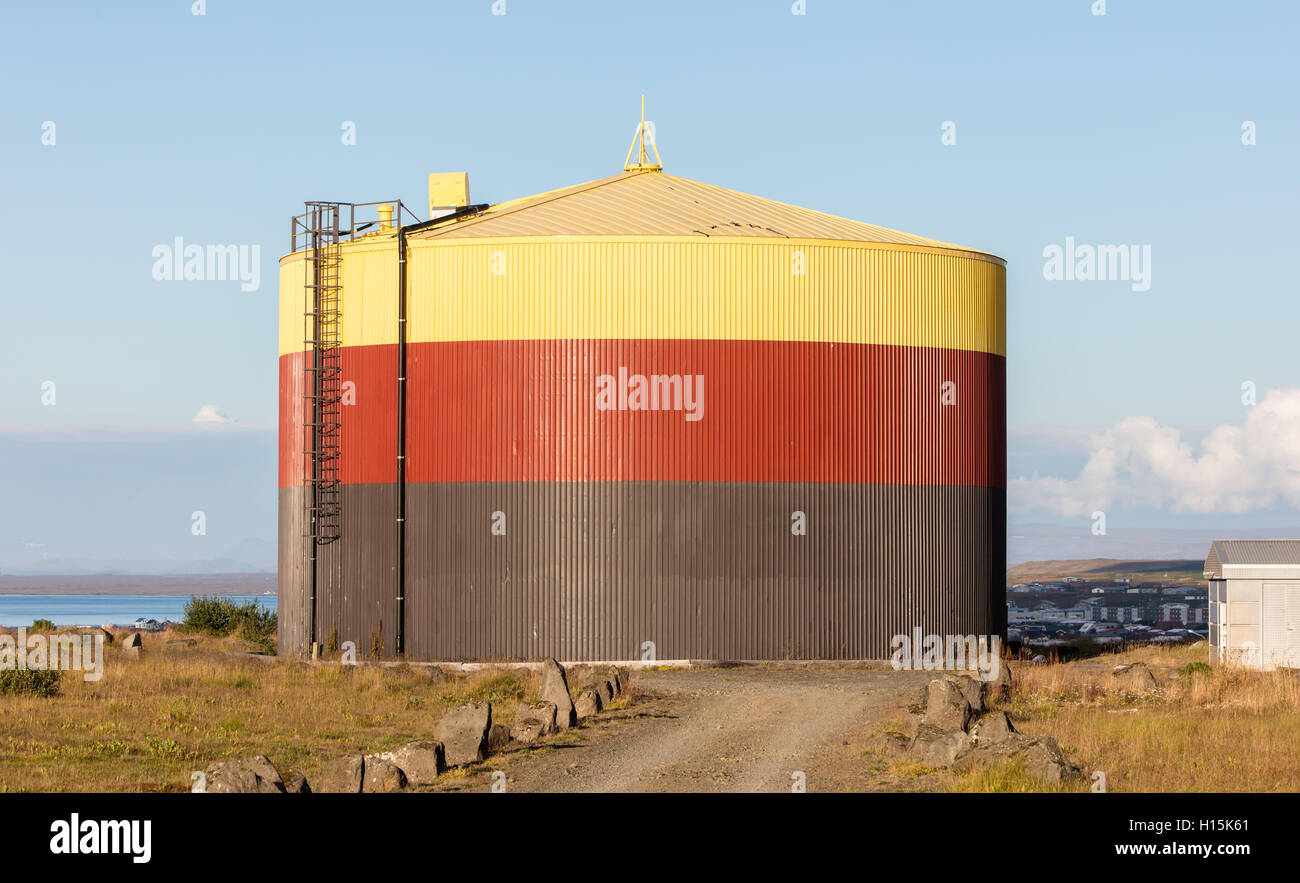 Colorful storage tank in the south of Iceland Stock Photo - Alamy
