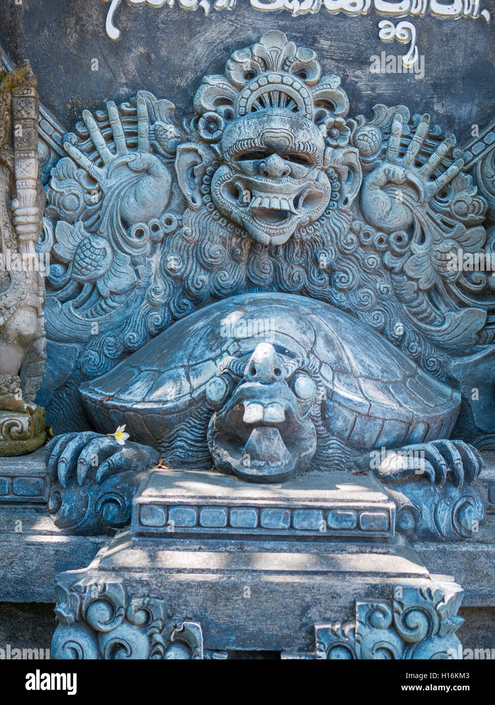 Stone sculpture on entrance door of Pura Padmasana Puja Mandala temple ...