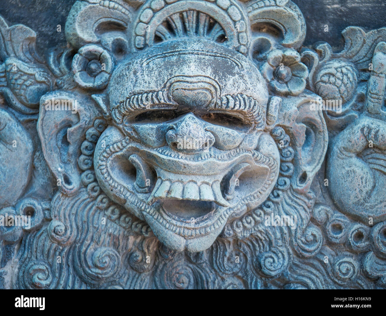 Stone sculpture on entrance door of Pura Padmasana Puja Mandala temple ...