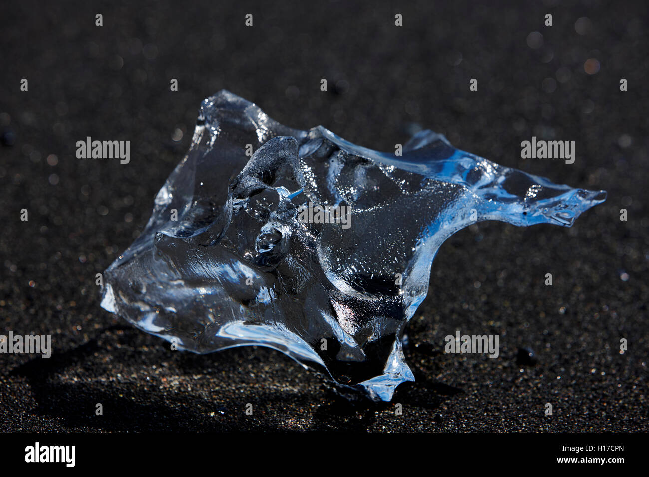 Ice washed up on black sand beach at jokulsarlon iceland Stock Photo ...