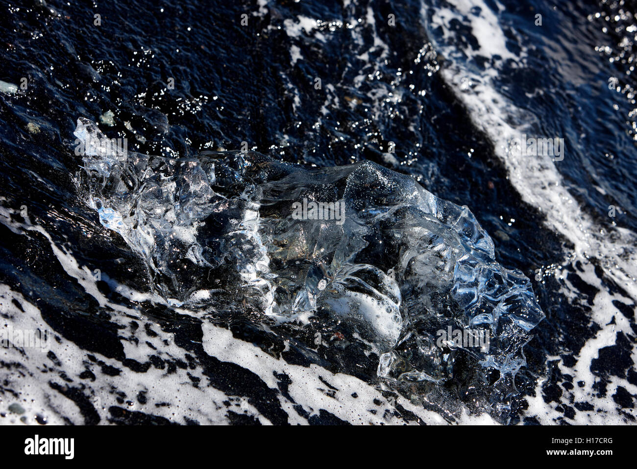 Ice washed up on black sand beach at jokulsarlon iceland Stock Photo ...