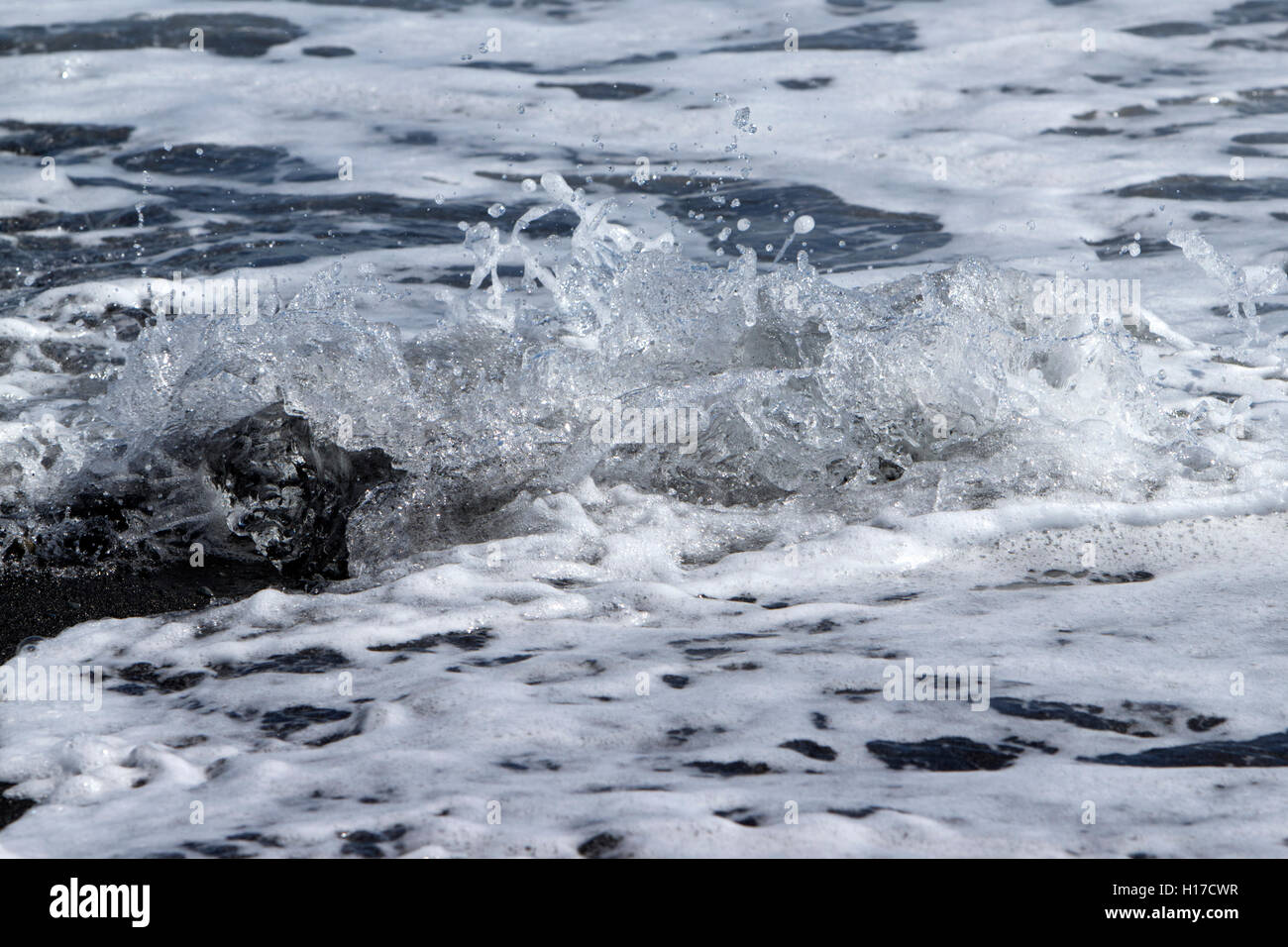 Ice washed up on black sand beach at jokulsarlon iceland Stock Photo ...
