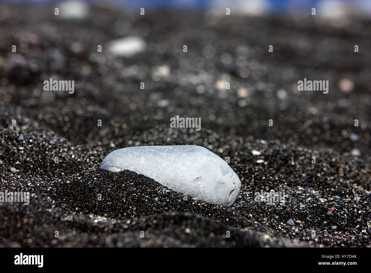 large pebble on black sand beach at jokulsarlon iceland Stock Photo - Alamy