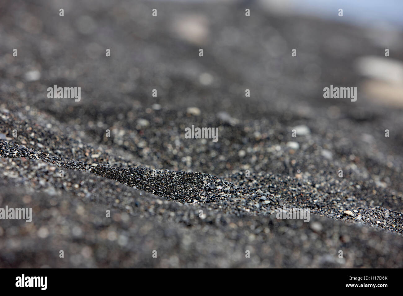 Black grains of sand hi-res stock photography and images - Alamy