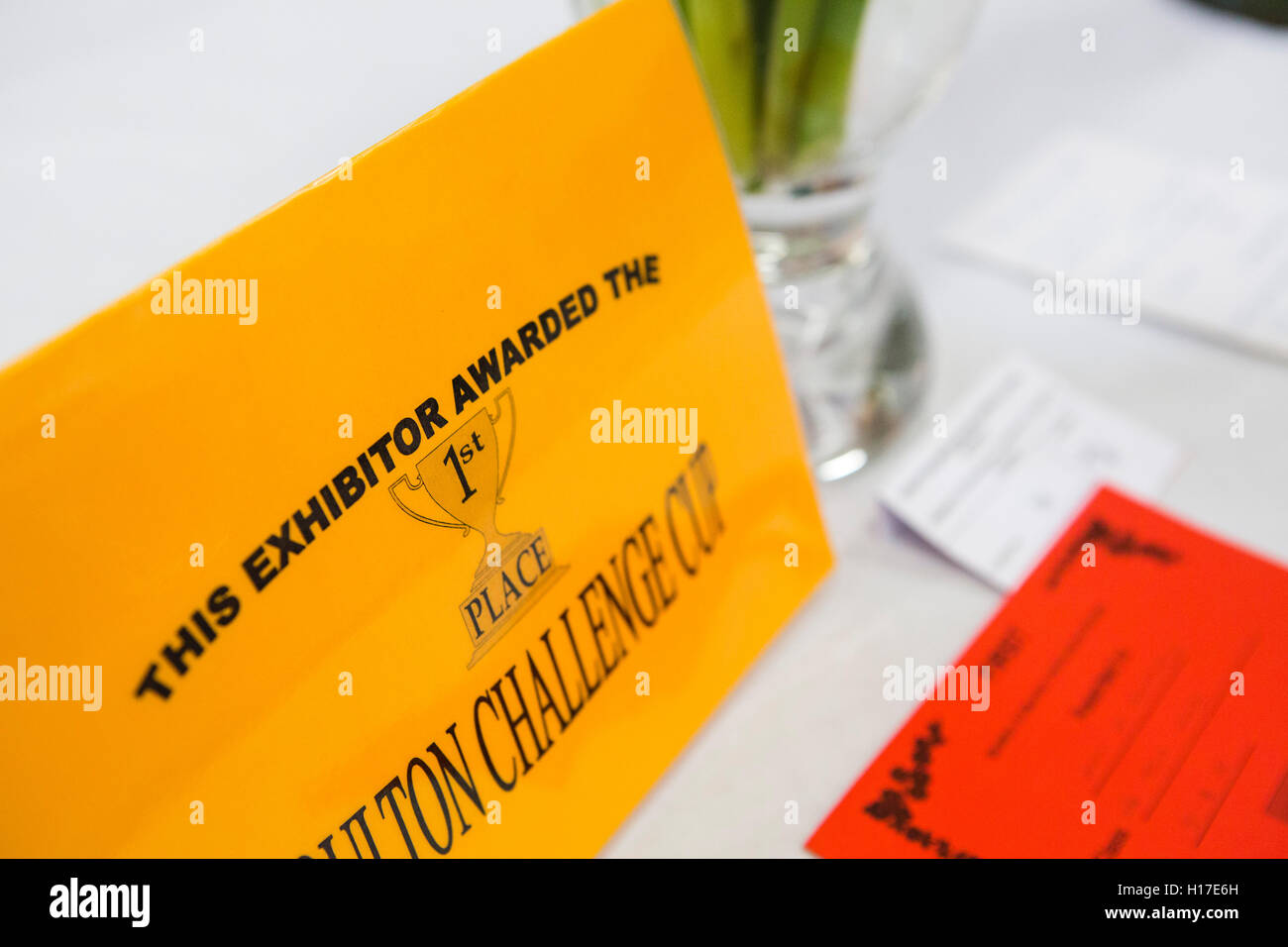 Awards card on a tableat a local produce show showing first prize for ...