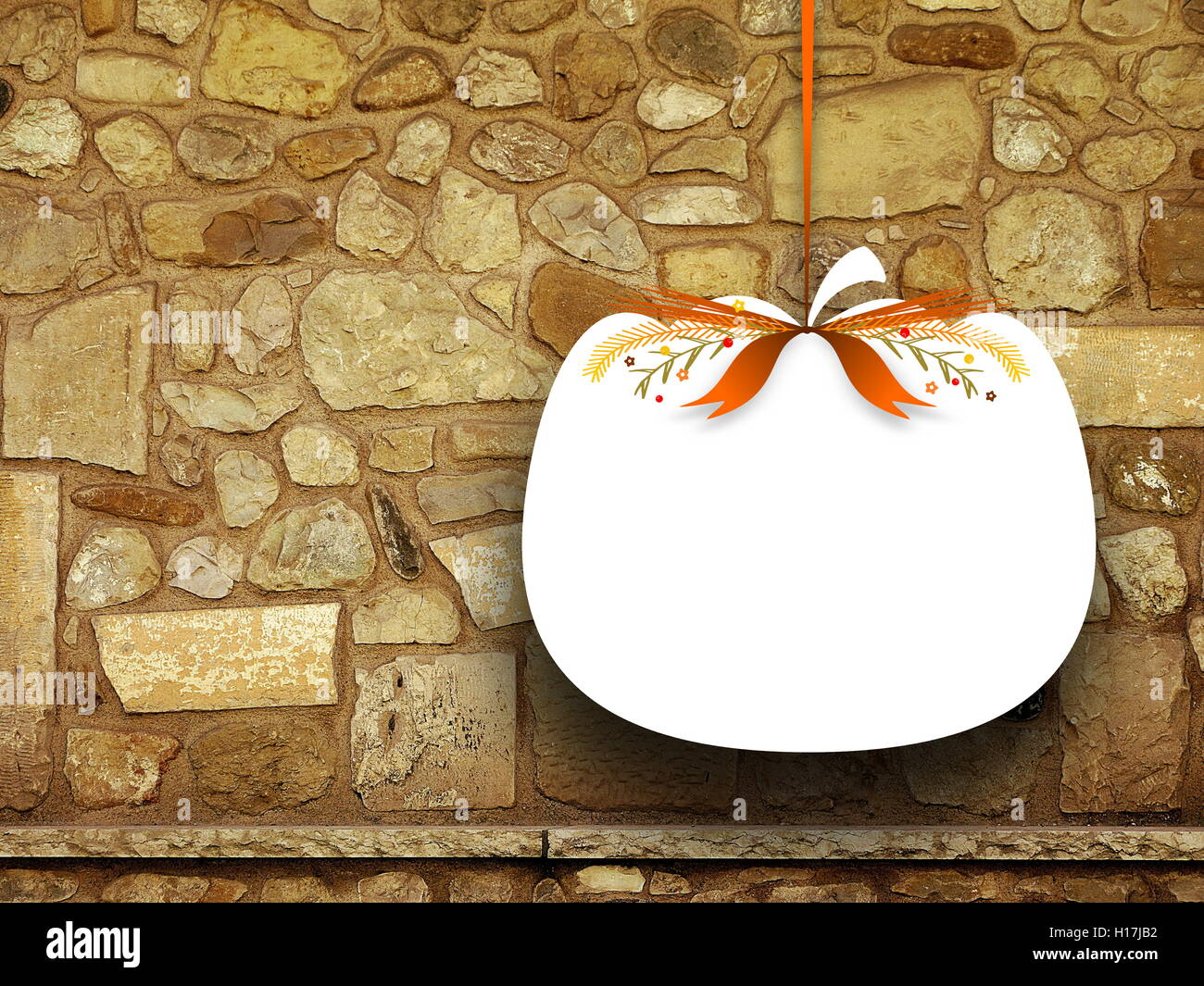 Close-up of one blank pumpkin shaped frame hanged by brown ribbon on ...