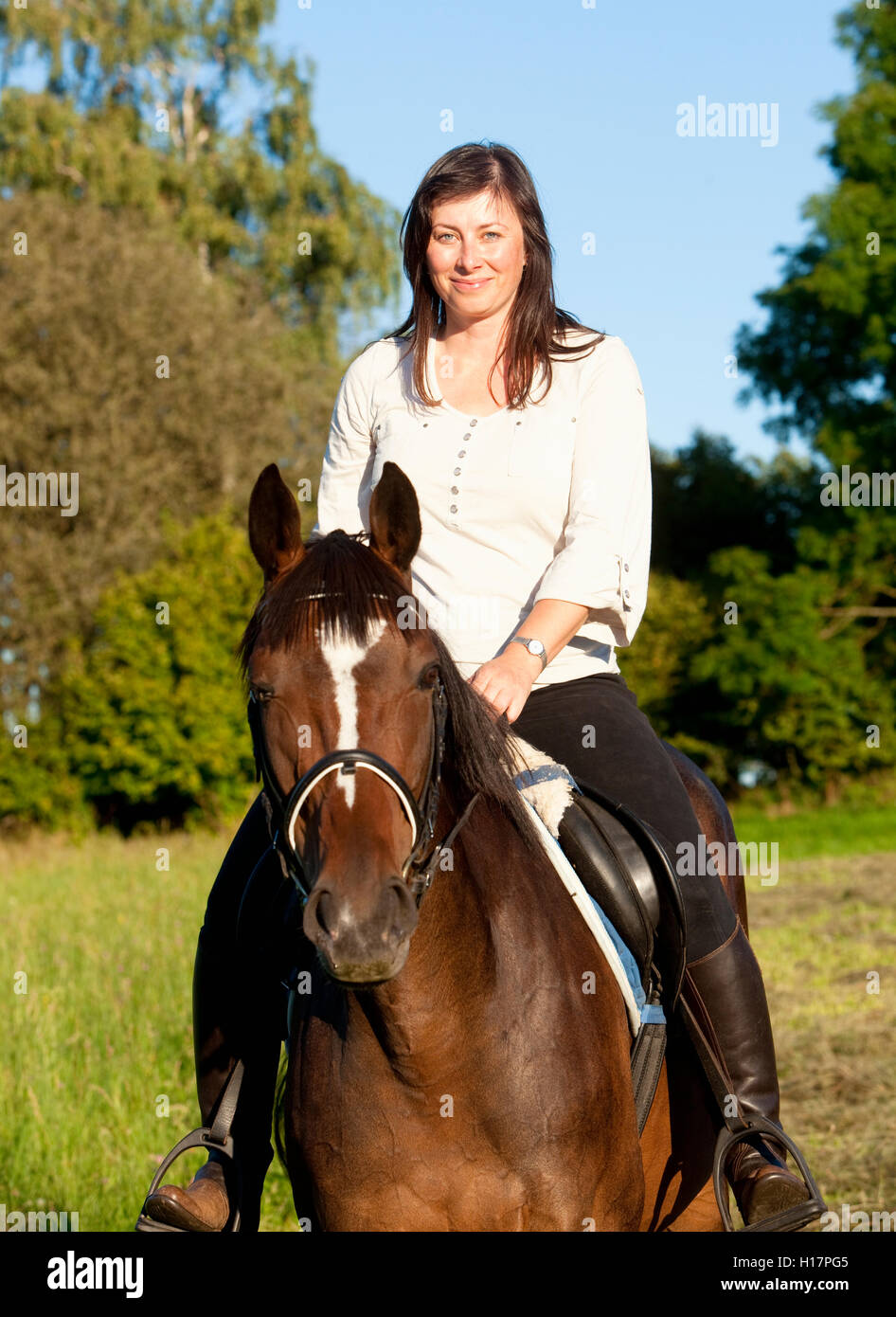 Beautiful girl riding horse hi-res stock photography and images - Alamy