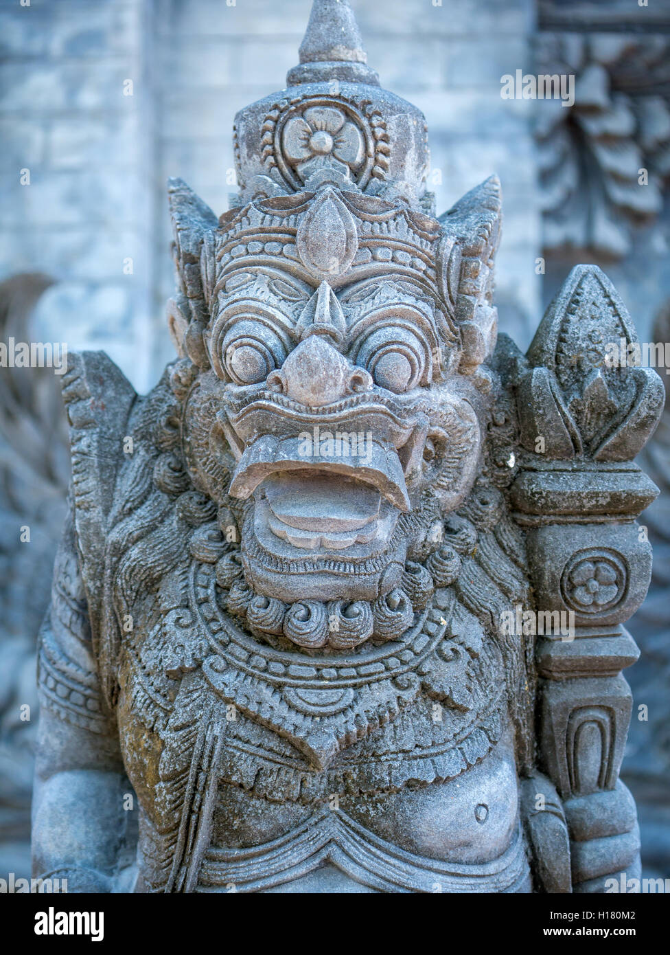 Stone sculpture on entrance door of Pura Padmasana Puja Mandala temple ...
