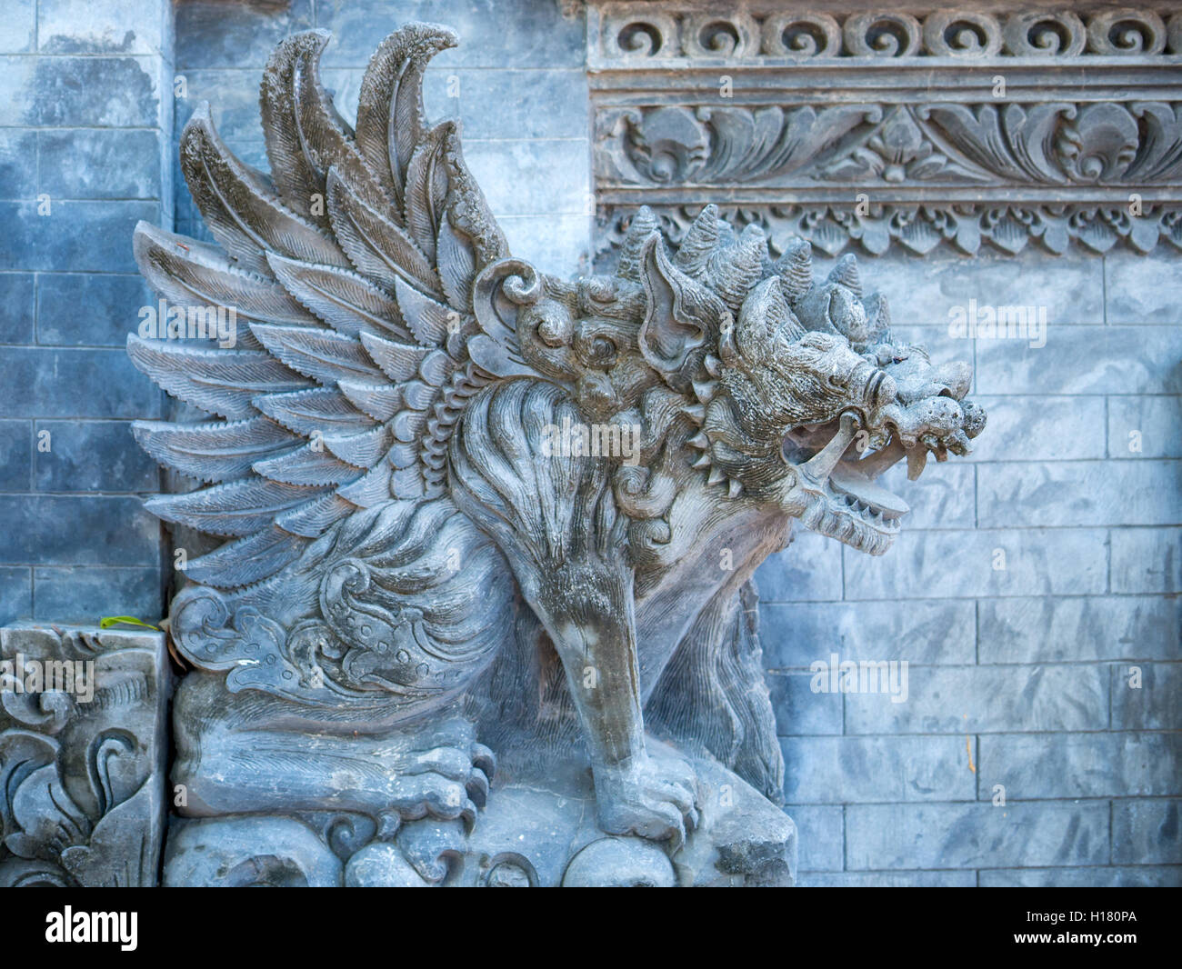 Stone sculpture on entrance door of Pura Padmasana Puja Mandala temple ...